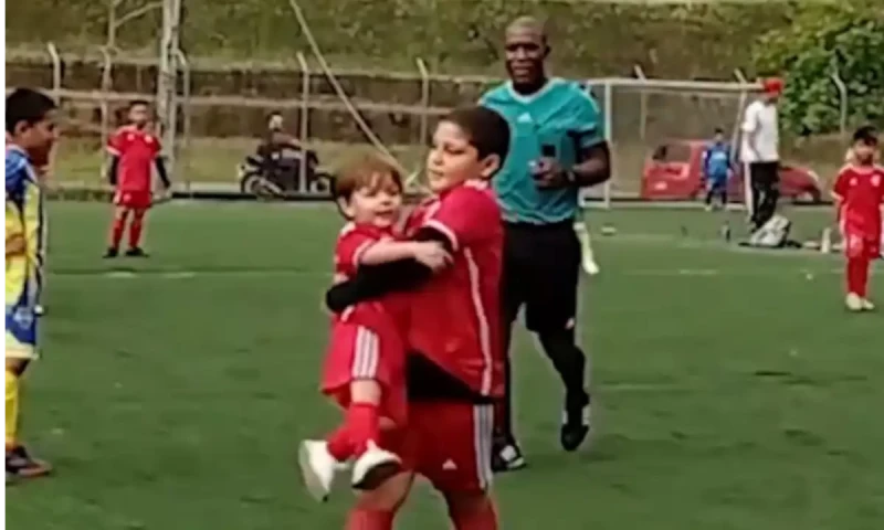 WATCH: ‘Youngest player’ receives comical red card, hug from referee ...